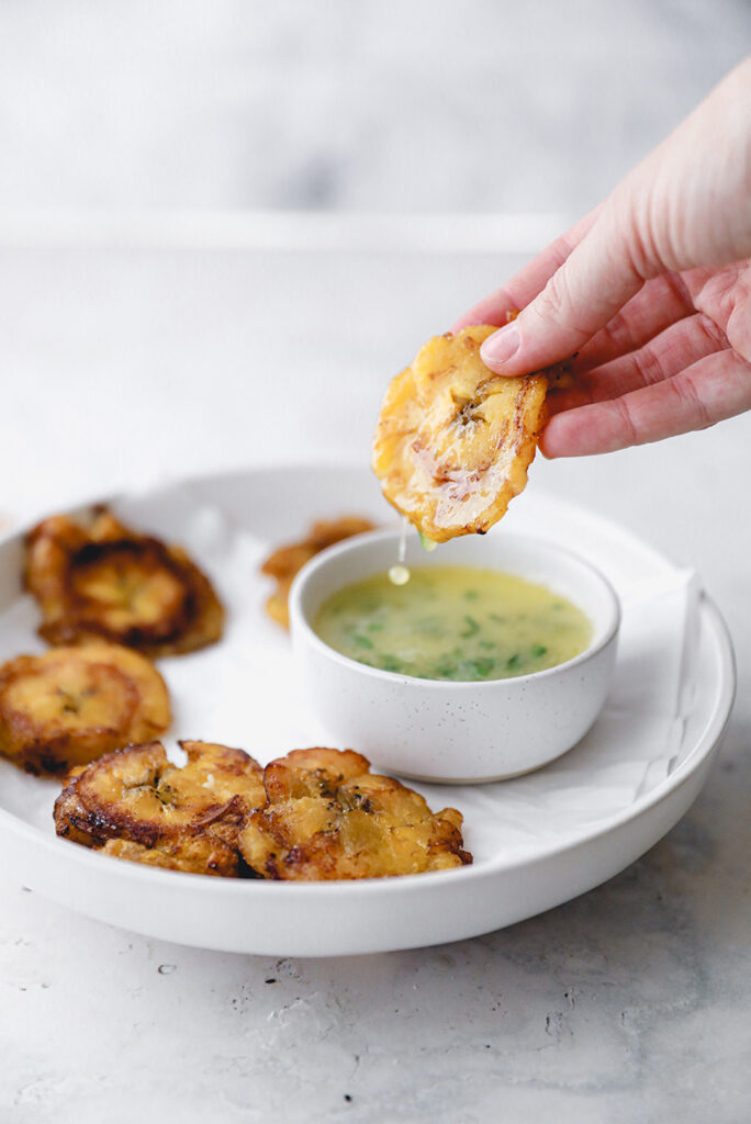 Crispy Tostones with Garlic Sauce - Cooked by Julie